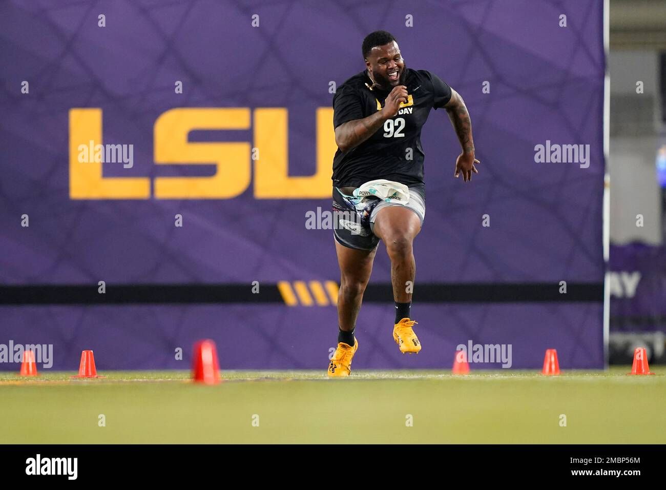 LSU defensive tackle Neil Farrell Jr. runs through drills during LSU ...