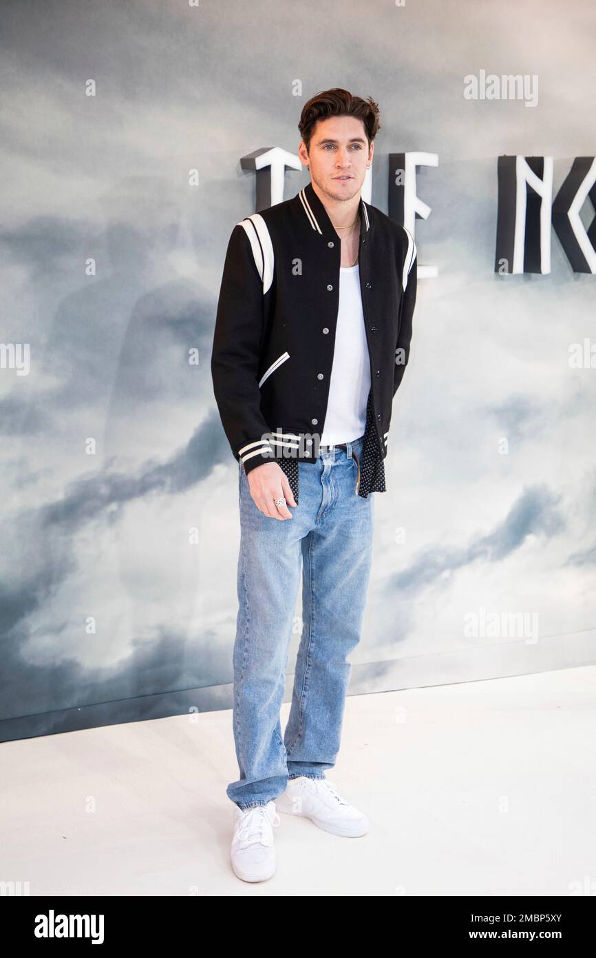 Isaac Carew poses for photographers upon arrival at the premiere of the ...