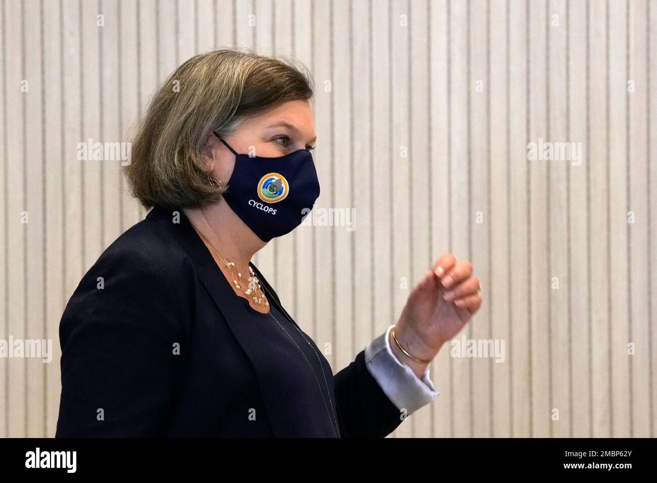 U.S. Under Secretary of State Victoria Nuland walks before a press ...