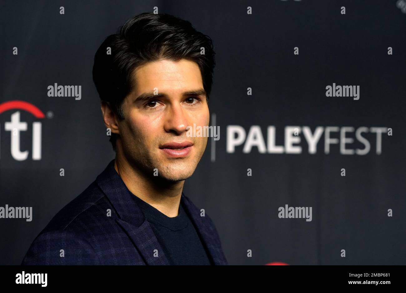 Asher Goodman, a cast member in the CBS series "Ghosts," poses before a ...