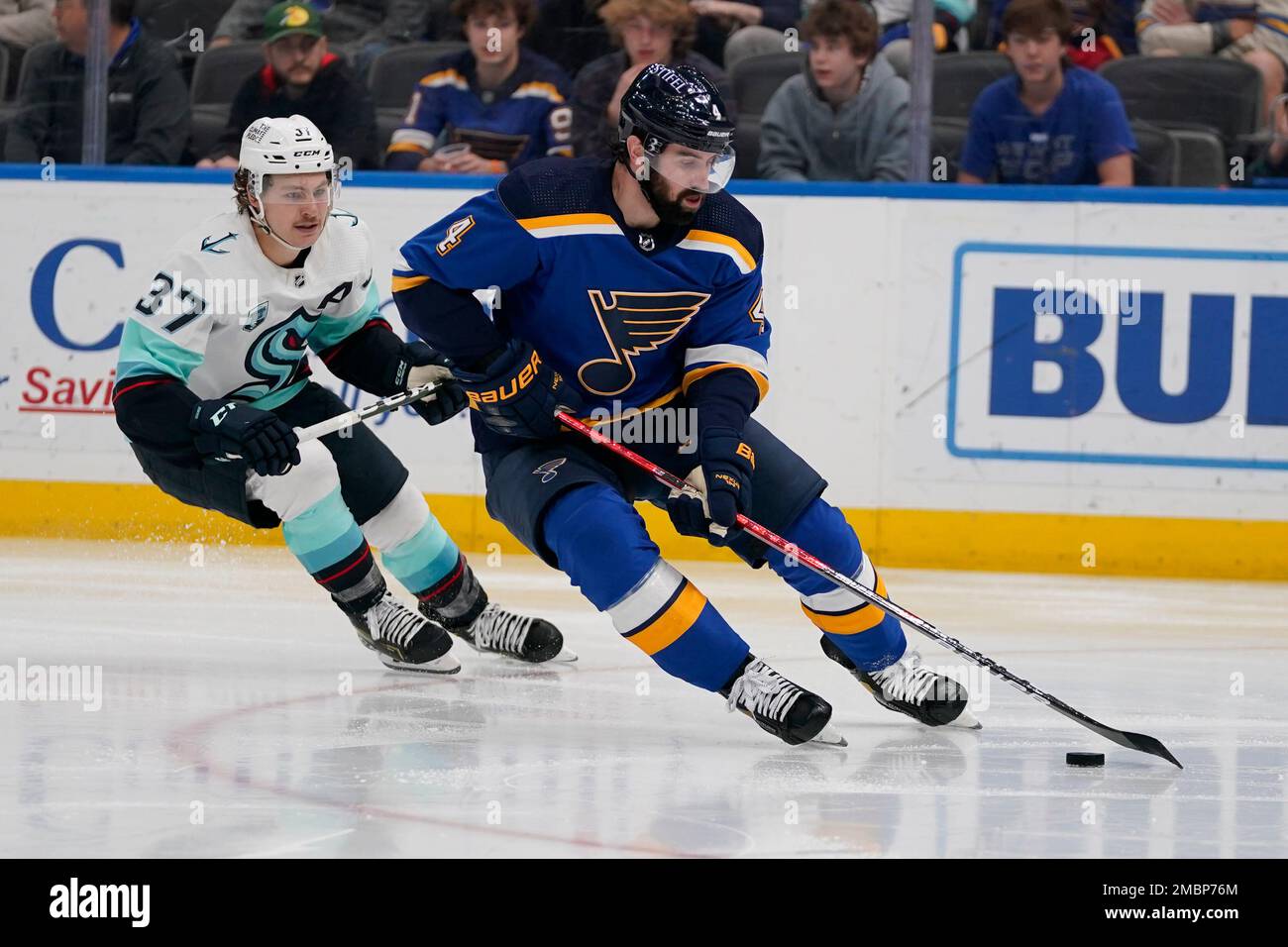 St. Louis Blues' Nick Leddy (4) handles the puck as Seattle Kraken's ...