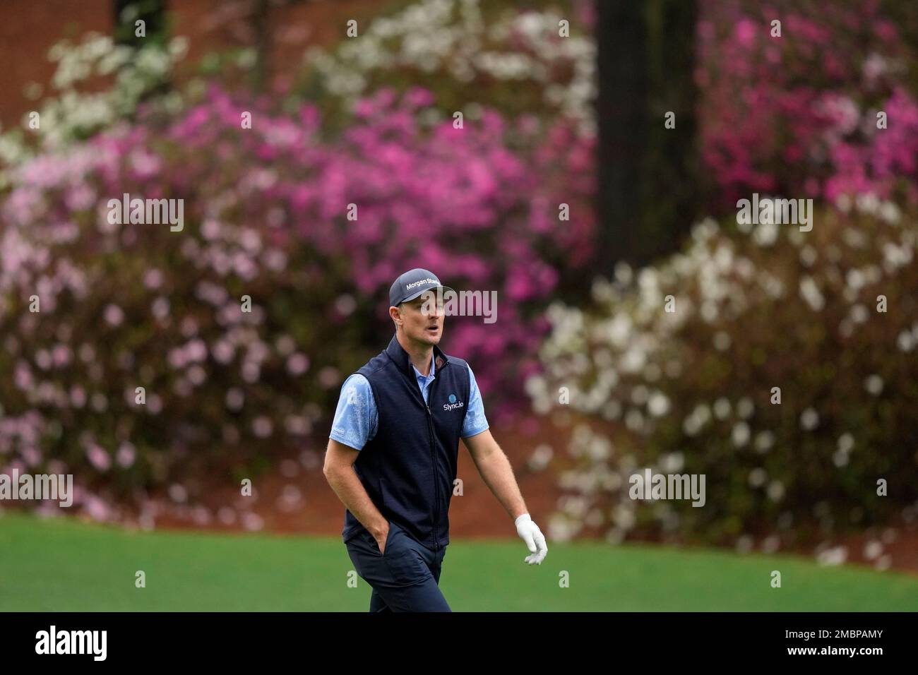 Justin Rose, of England, walks on the 13th hole during a practice round ...