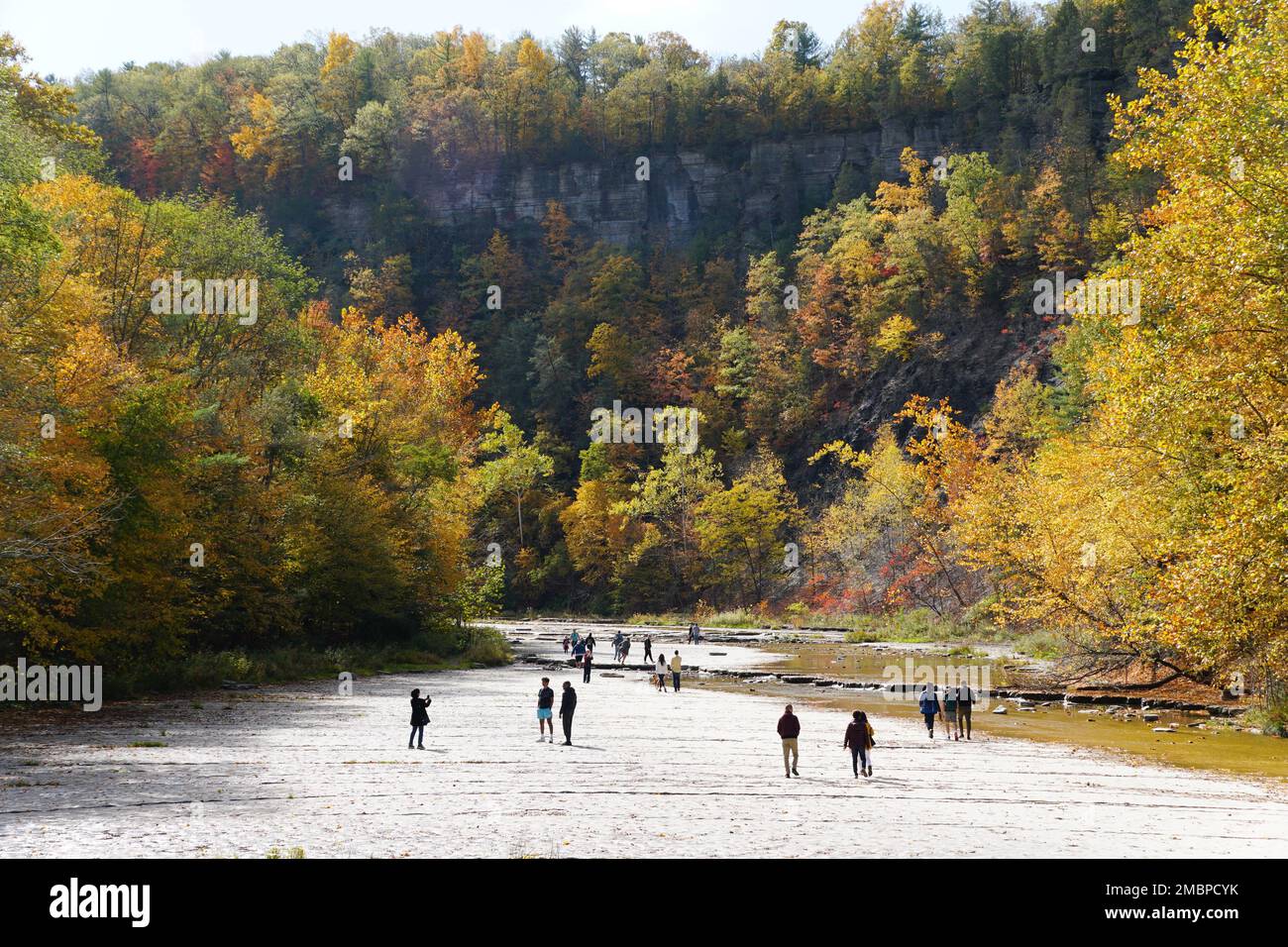 The flat rock and river bed at Taughannock Falls with the background of ...