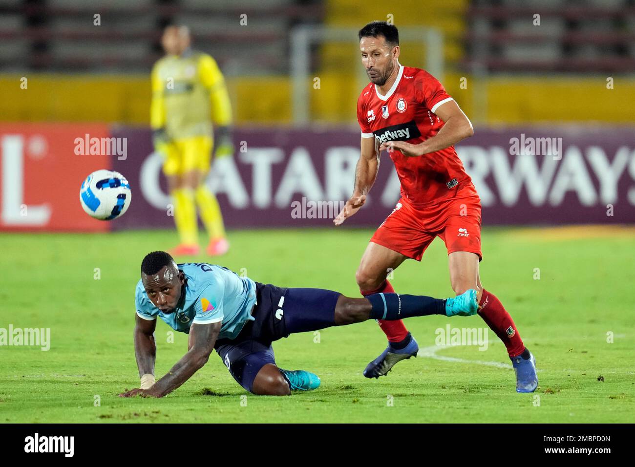 Rodrigo Rivas of Ecuador's Universidad Catolica, left, fights for the ...