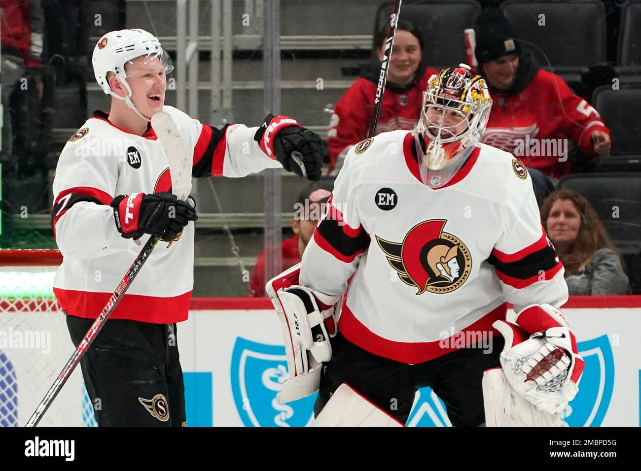 Ottawa Senators goaltender Mads Sogaard, right, celebrates with Brady ...
