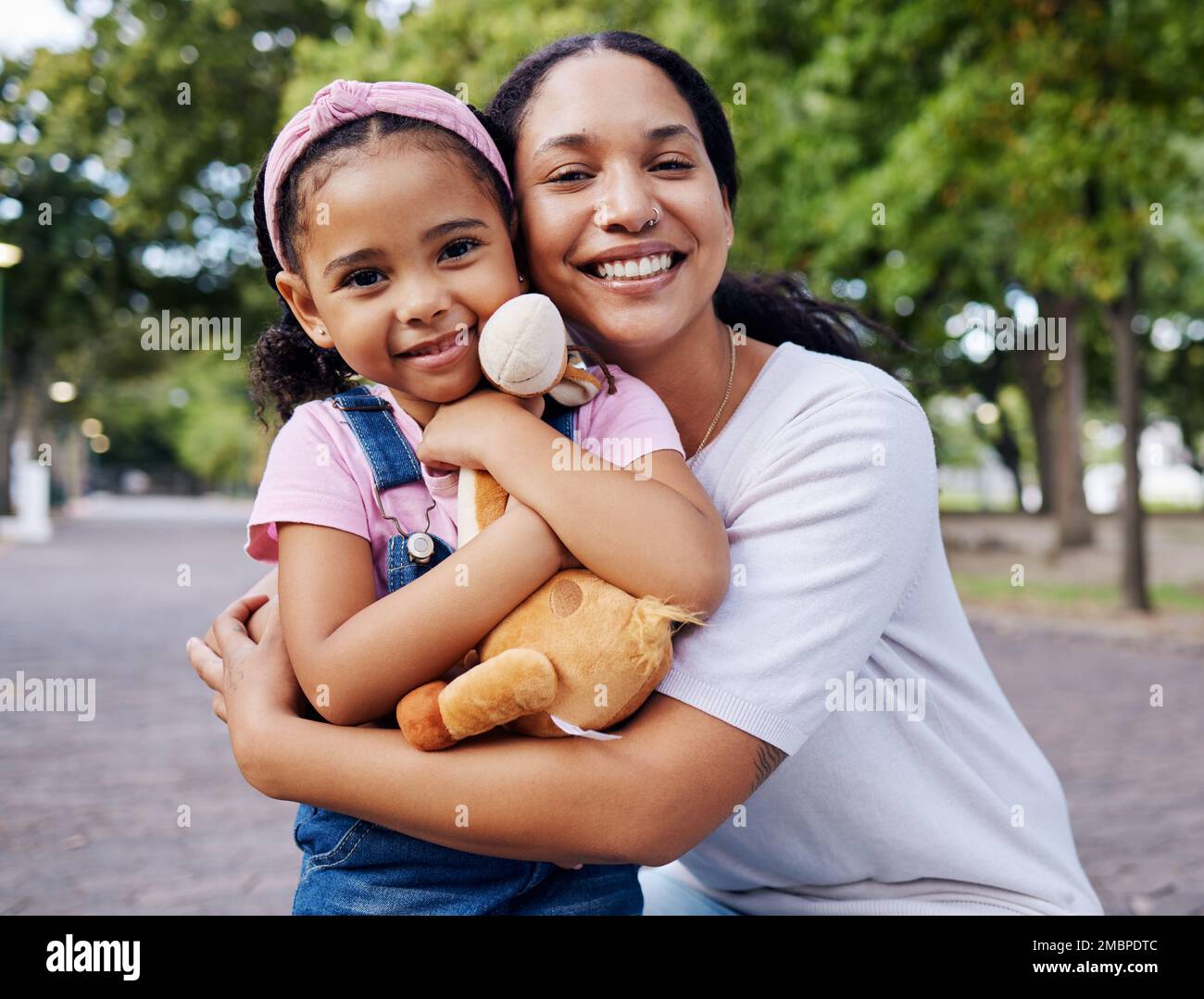 Portrait, mother and child hug in park, fun day outdoor with love and care, happy people ...