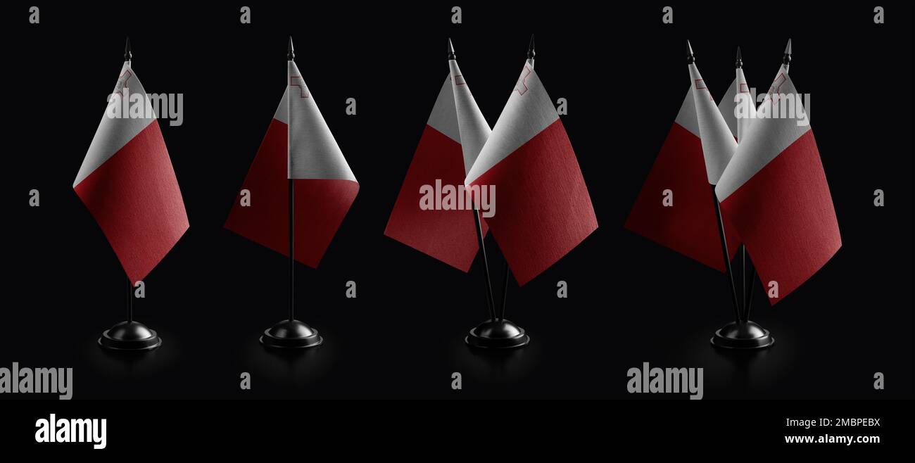 Small national flags of the Malta on a black background Stock Photo - Alamy