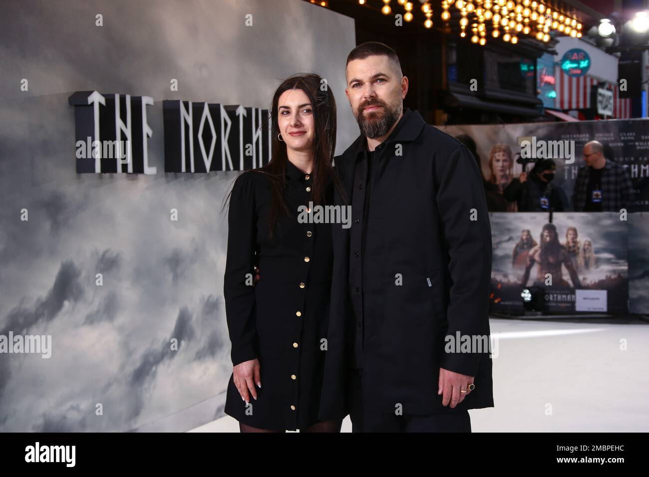 Robert Eggers, right, and Alexandra Shaker pose for photographers upon ...