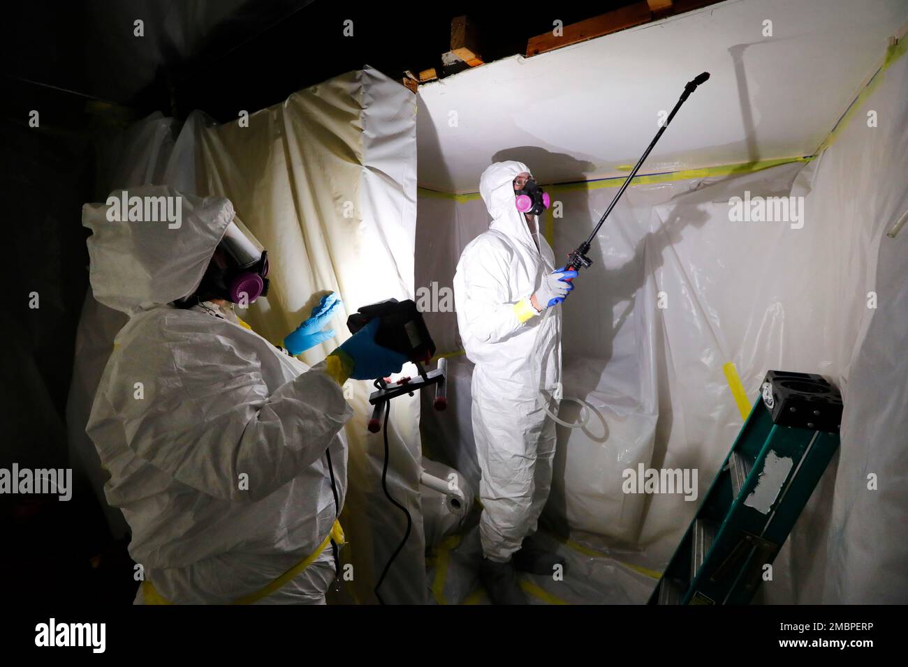 FILE - Asbestos Removal Technologies Inc., job superintendent Ryan ...