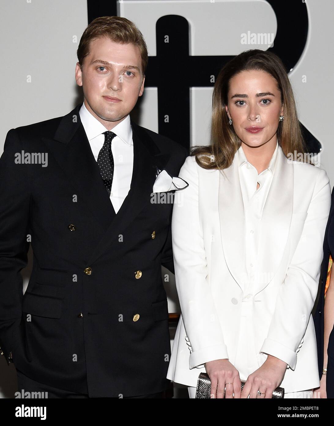 Naomi Biden, right, and fiancé Peter Neal attend the Ralph Lauren Fall ...