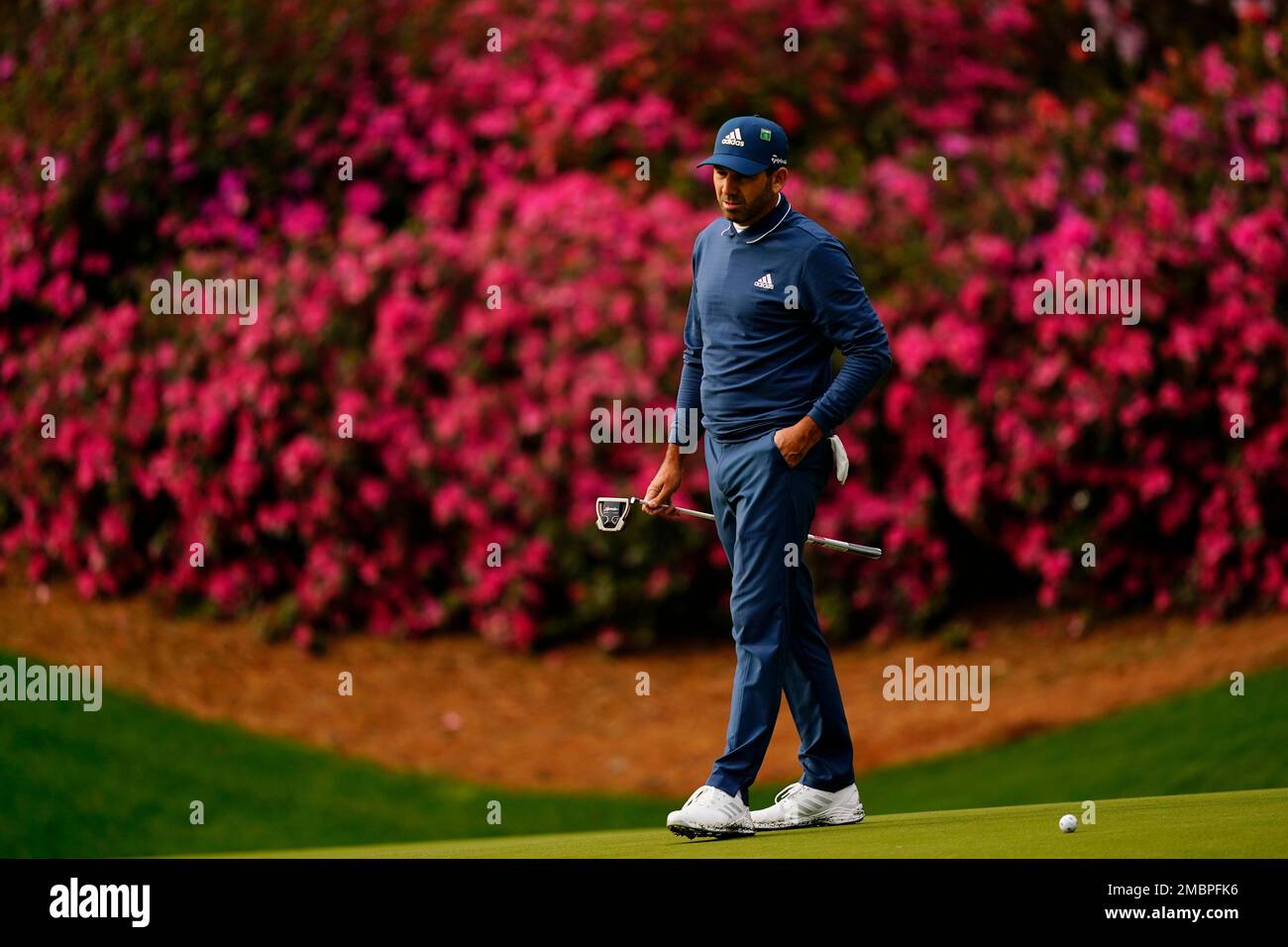 Sergio Garcia, of Spain, prepares to putt on the 13th green during a ...