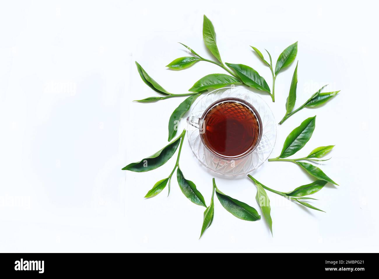 Tea Leaf With Tea Cup Stock Photo - Alamy