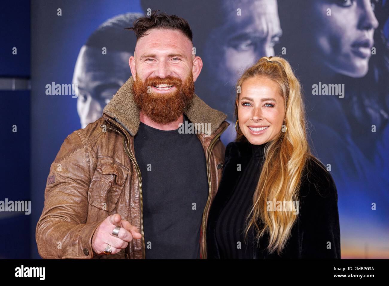 Devan Long, left and Jesse Golden arrive at the premiere of "Ambulance ...