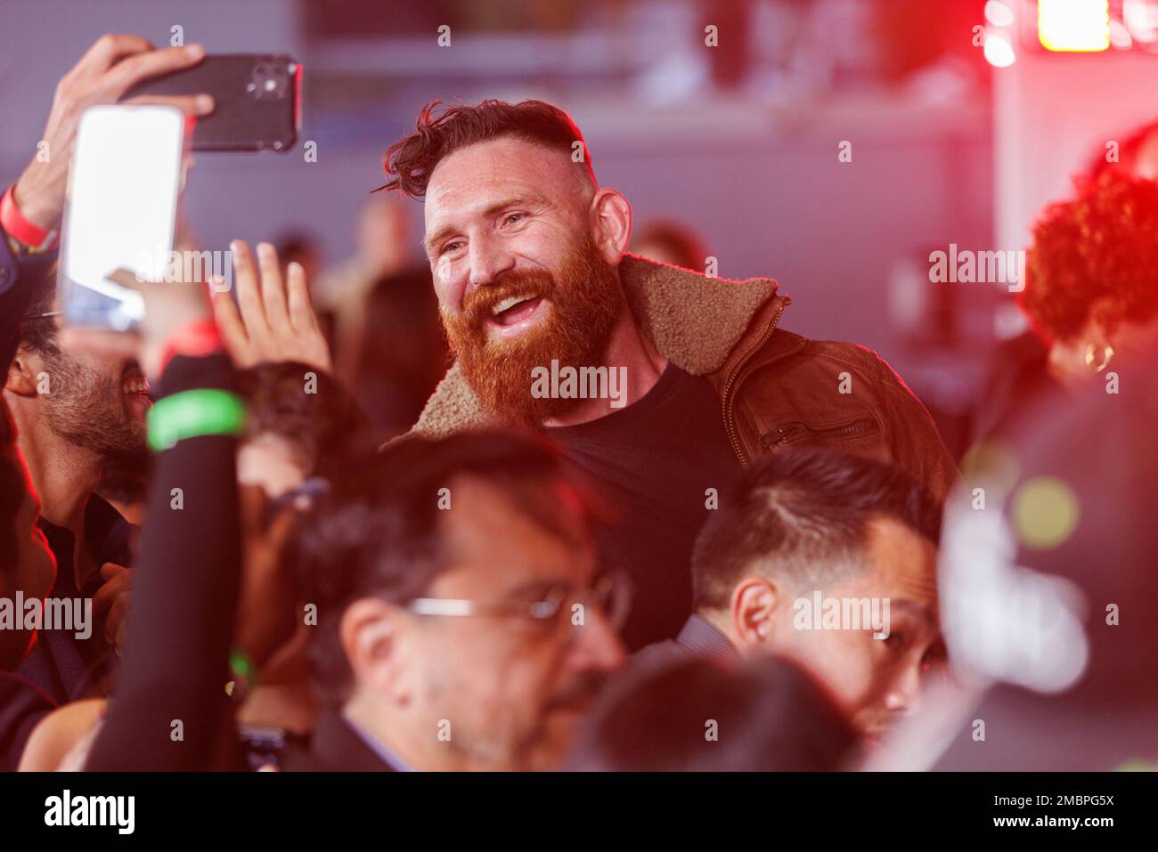 Devan Long takes a selfie with some fans as he arrives at the premiere ...