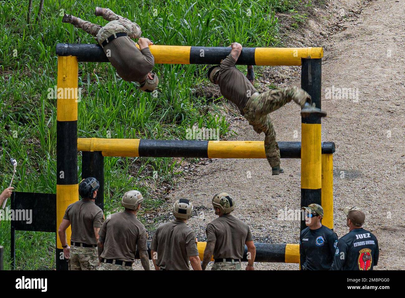 LA VENTA, Honduras - U.S. Army service members pass through an obstacle ...