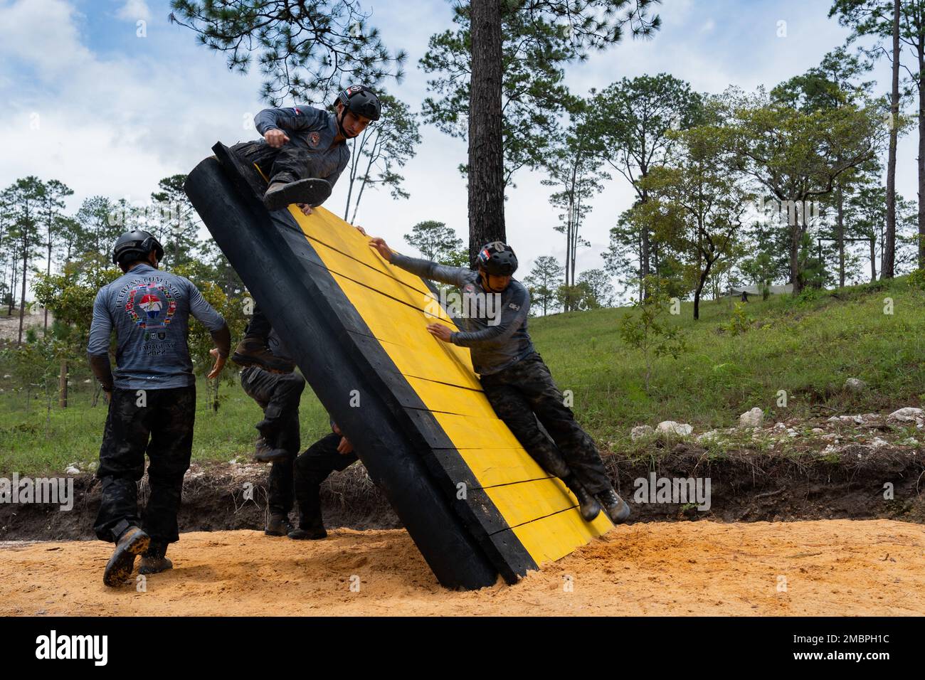LA VENTA, Honduras - Military forces pass through an obstacle course ...