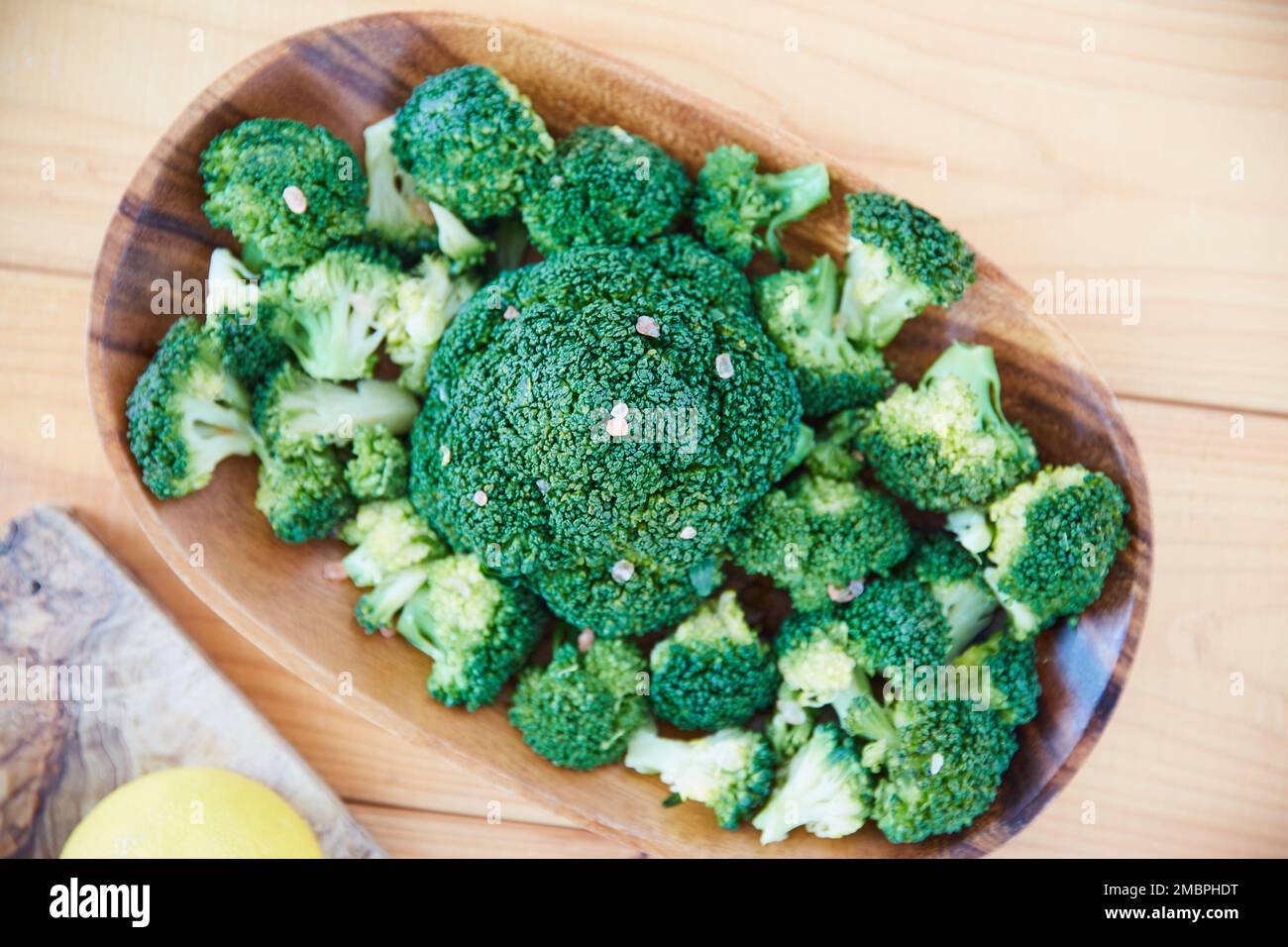 The foods we choose make a difference. Overhead shot of raw broccoli in ...