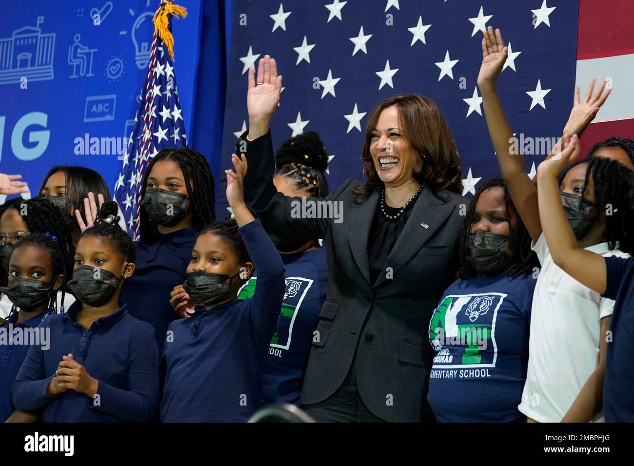 Vice President Kamala Harris poses for a photo with students at Thomas ...