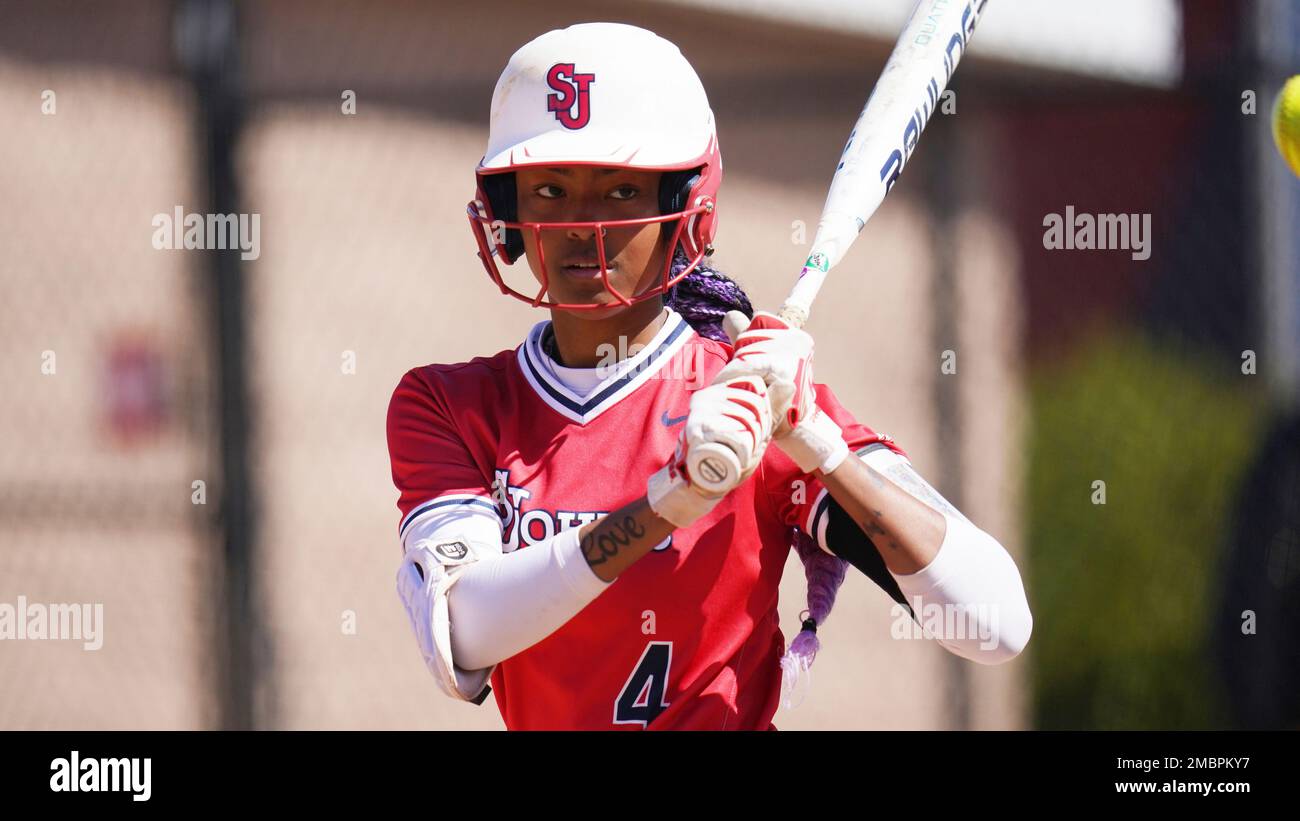 St. John's (NY) utility Meisha Murray (4) bats during an NCAA softball ...