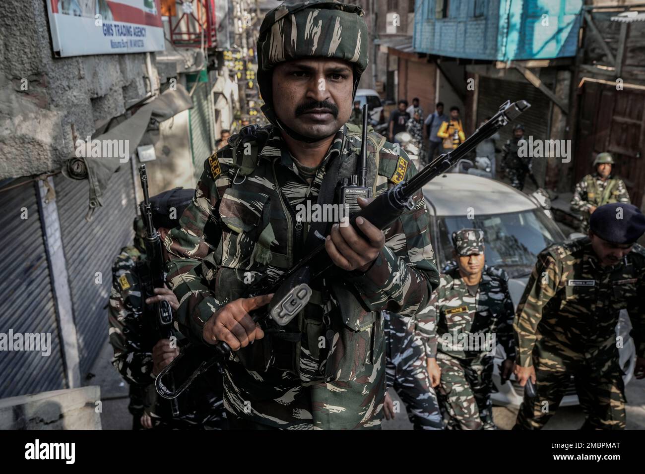 Indian paramilitary soldiers arrive at the site of shootout after ...