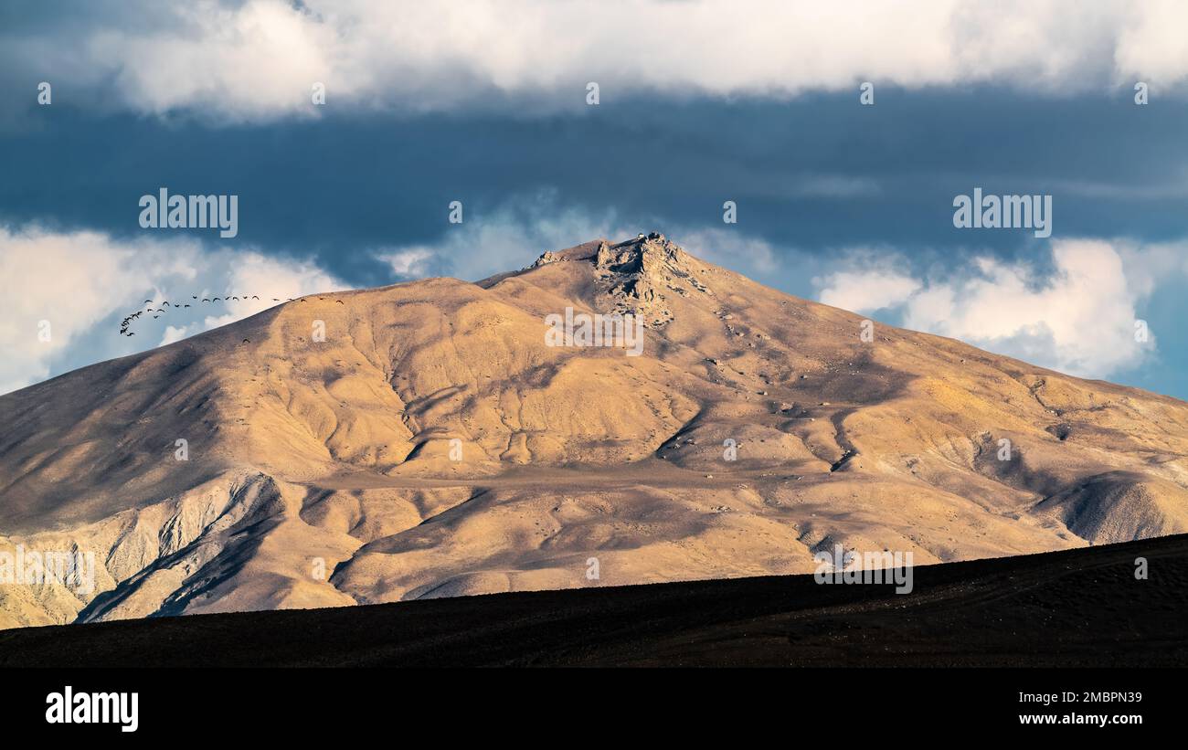Beautiful clouds over the top of the mountain Stock Photo - Alamy