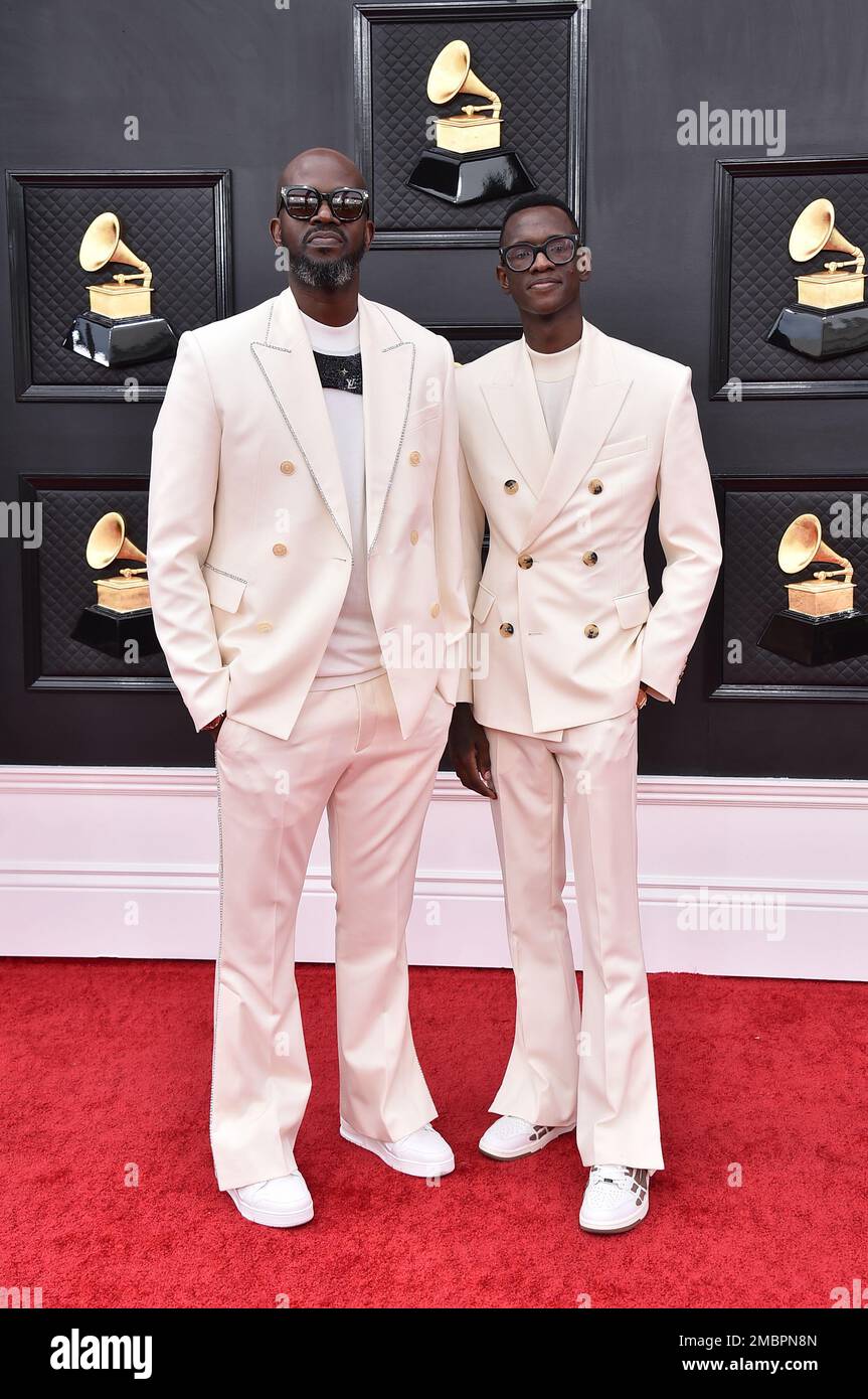 DJ Black Coffee, left, and Esona Maphumulo arrive at the 64th Annual ...