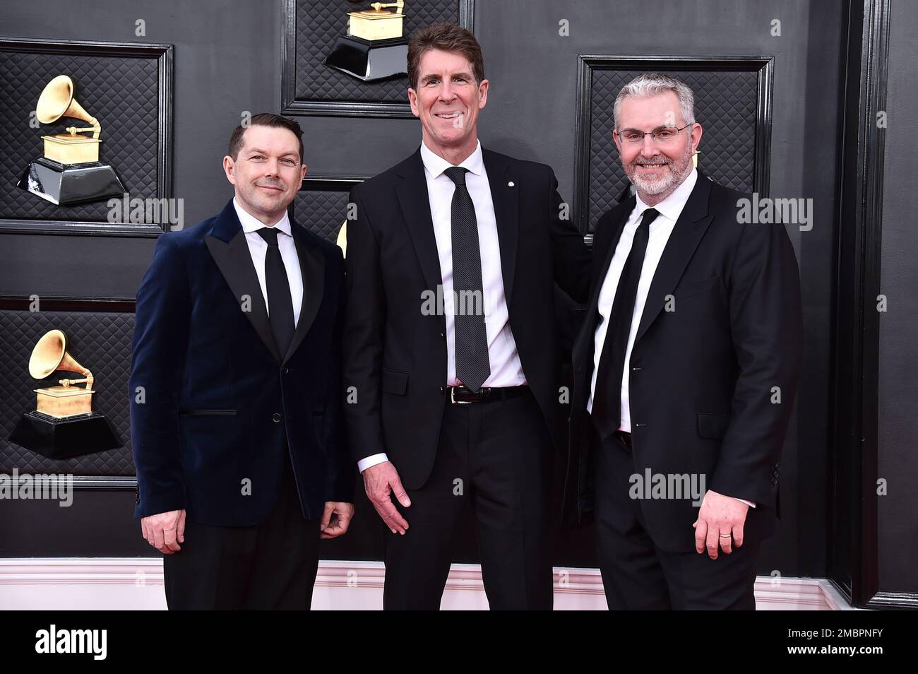 Doug Besterman, from left, Cinco Paul and Scott M. Riesett arrive at ...