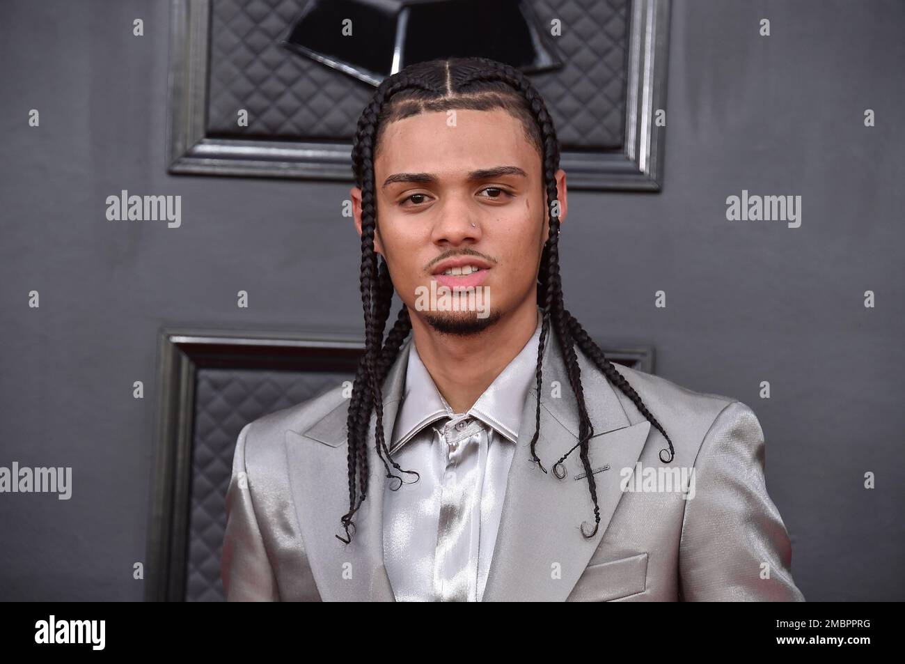 Zeus Blessings arrives at the 64th Annual Grammy Awards at the MGM ...