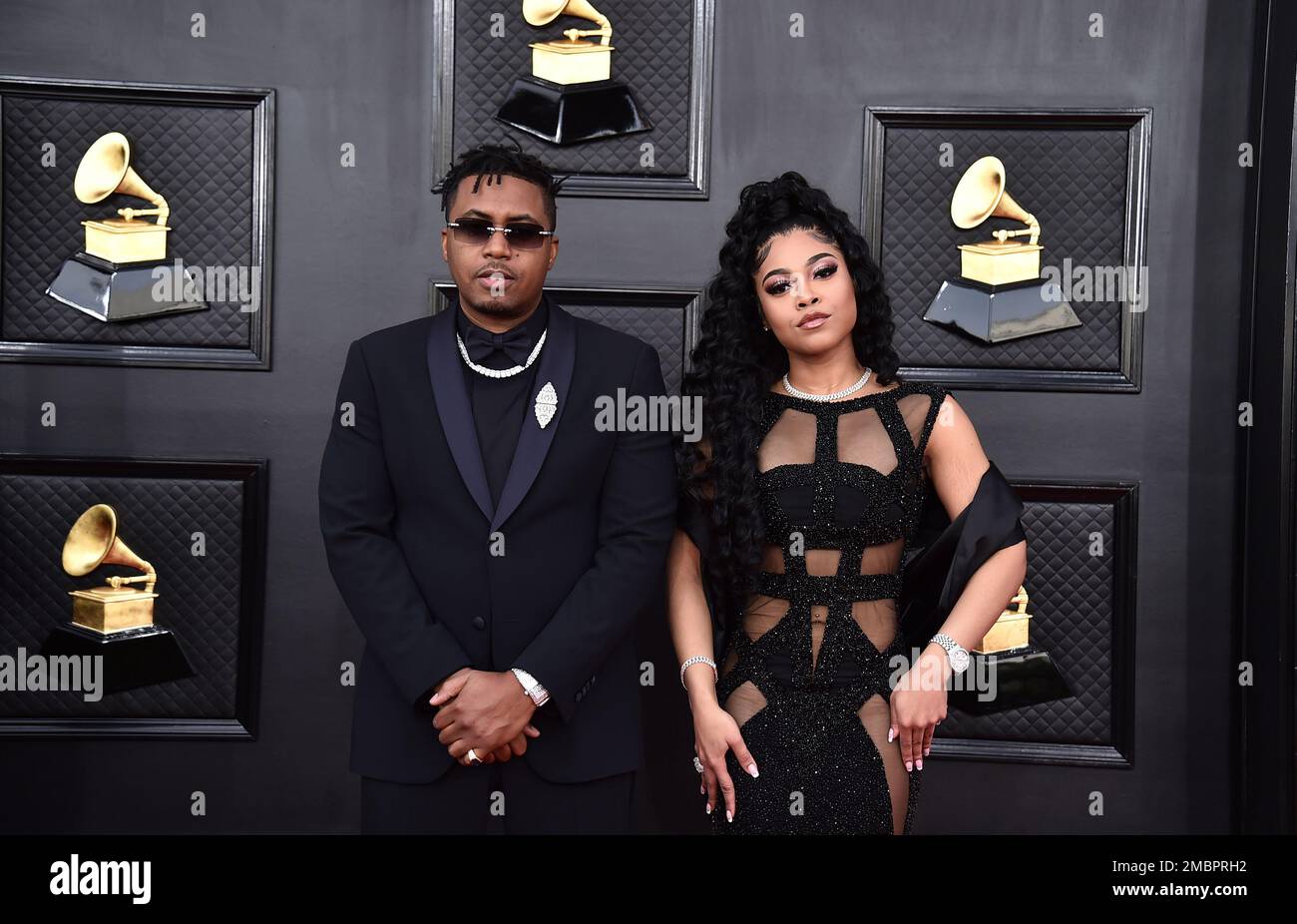 Nas, left, and Destiny Jones arrive at the 64th Annual Grammy Awards at ...