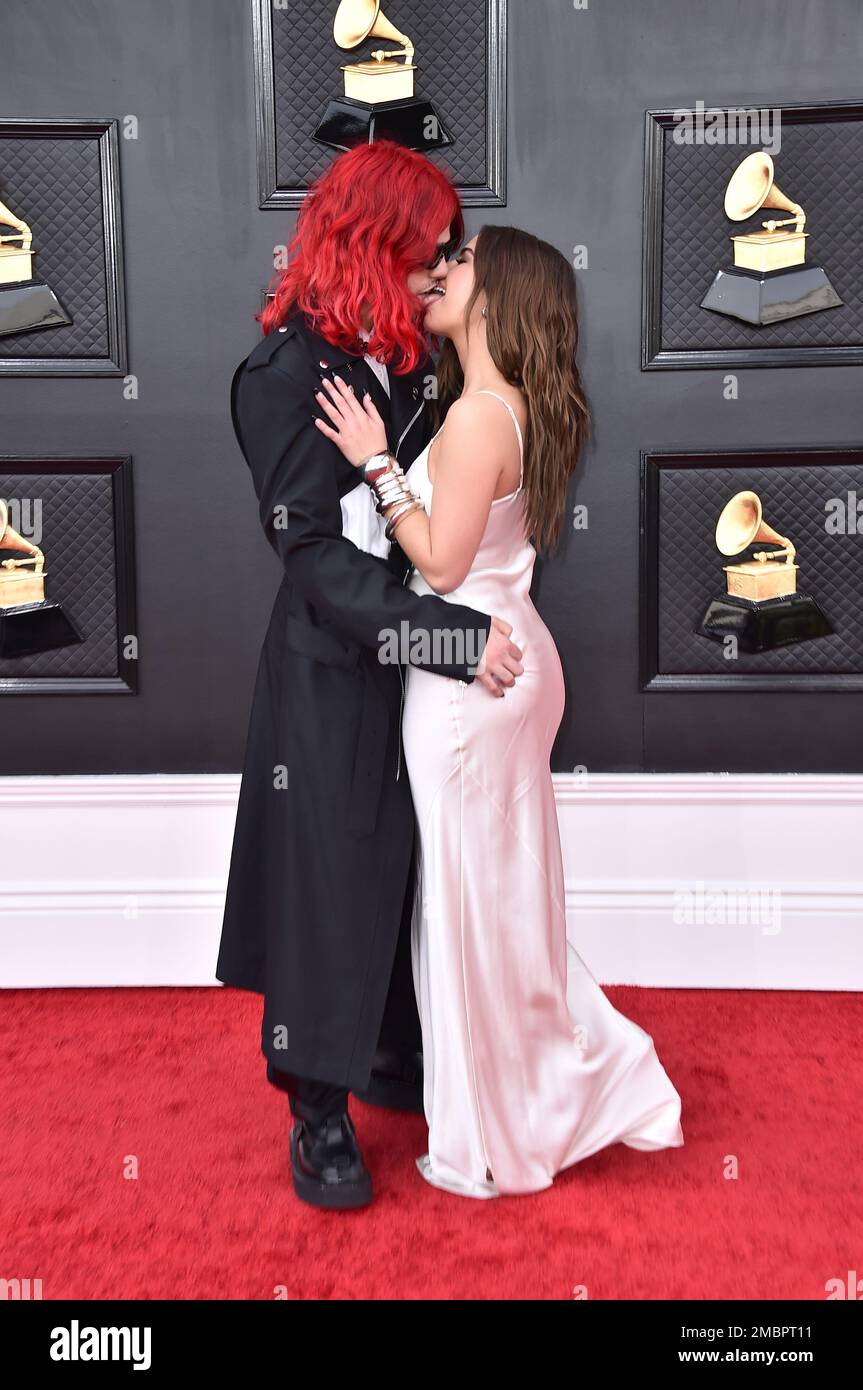 Omer Fedi, left, and Addison Rae arrive at the 64th Annual Grammy ...
