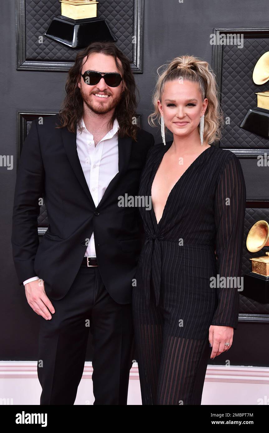 Zach Lund, left, and Maggie Lund arrive at the 64th Annual Grammy ...