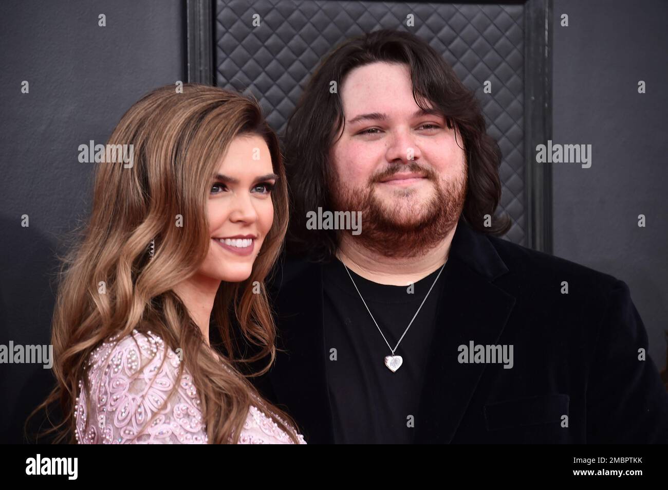 Andraia Allsop, left, and Wolfgang Van Halen arrive at the 64th Annual ...