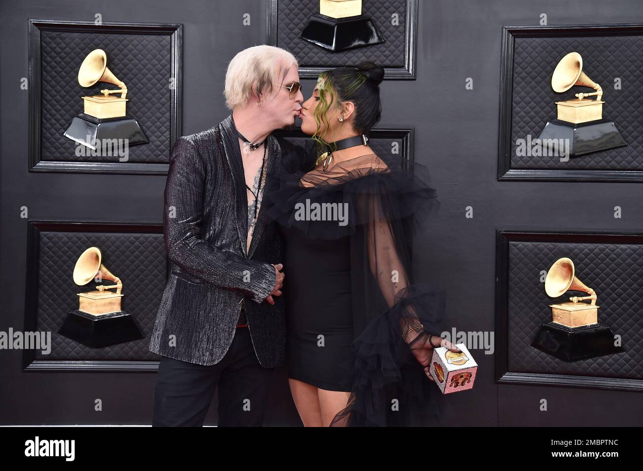 John 5, left, and Rita Lowery arrive at the 64th Annual Grammy Awards ...