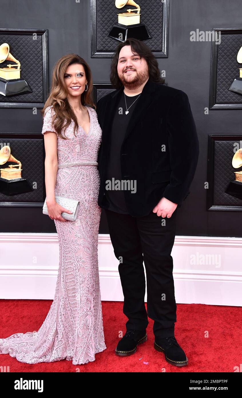 Andraia Allsop, left, and Wolfgang Van Halen arrive at the 64th Annual ...