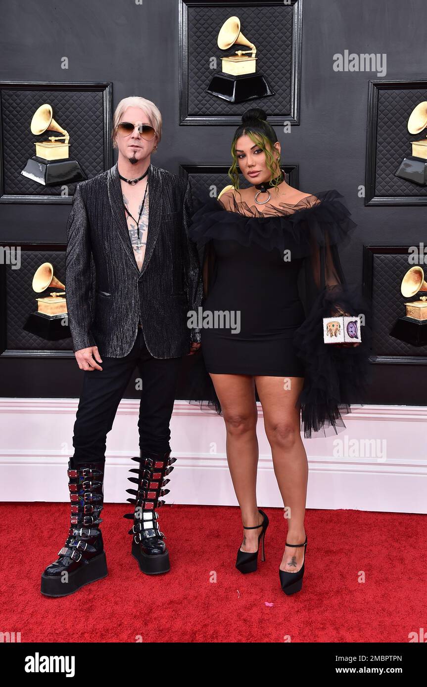 John 5, left, and Rita Lowery arrive at the 64th Annual Grammy Awards ...