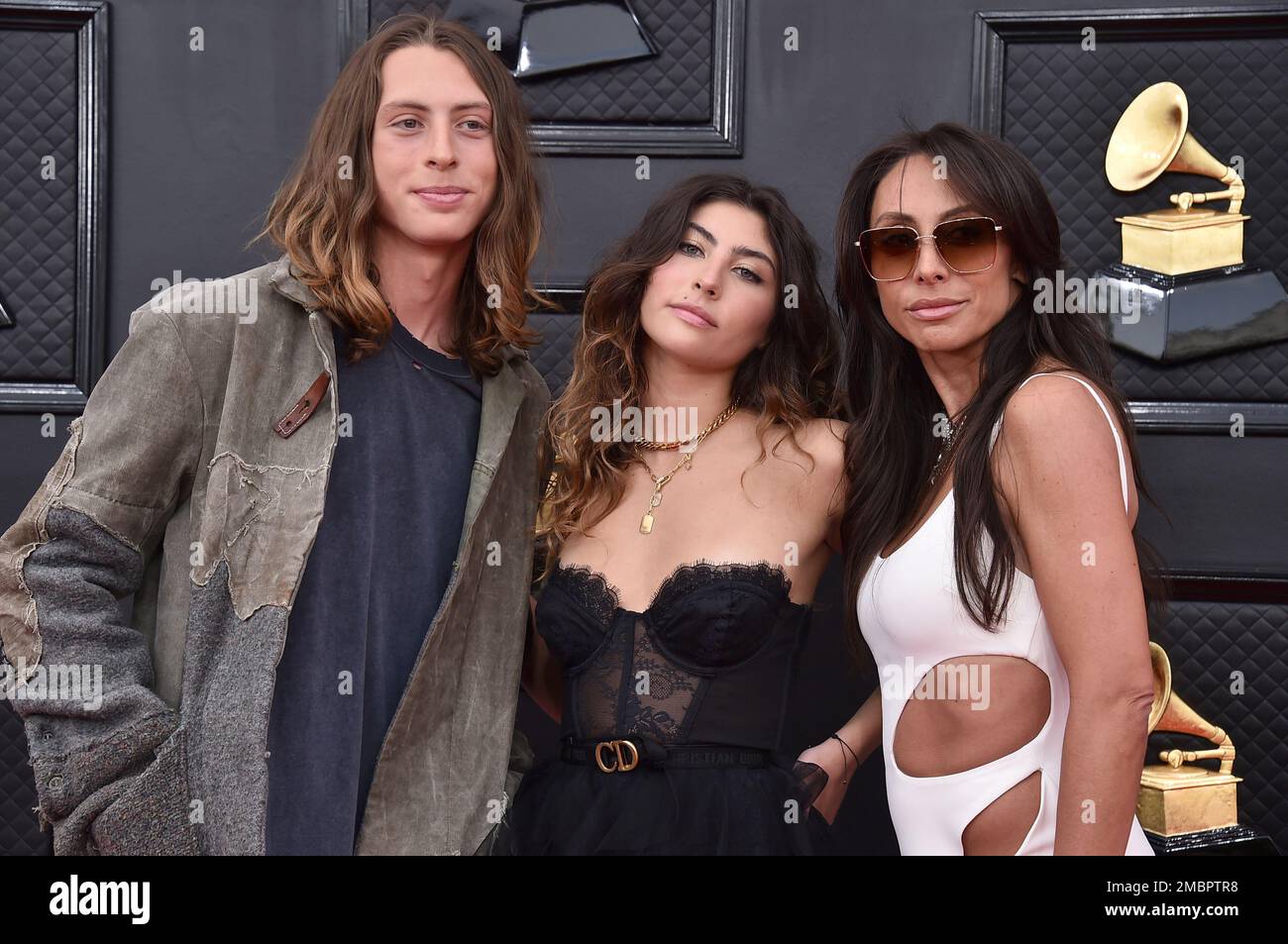 Christopher Nicholas Cornell, from left, Toni Cornell, and Vicky Karayiannis arrive at the 64th ...