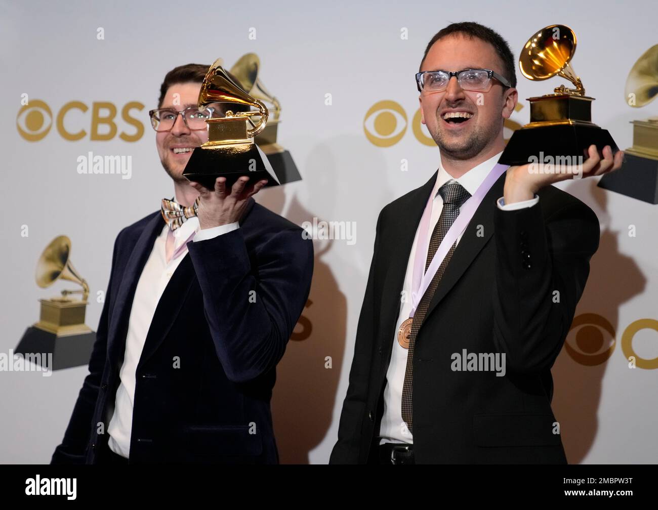 Jake Silverman, left, and Charlie Rosen pose in the press room with the ...