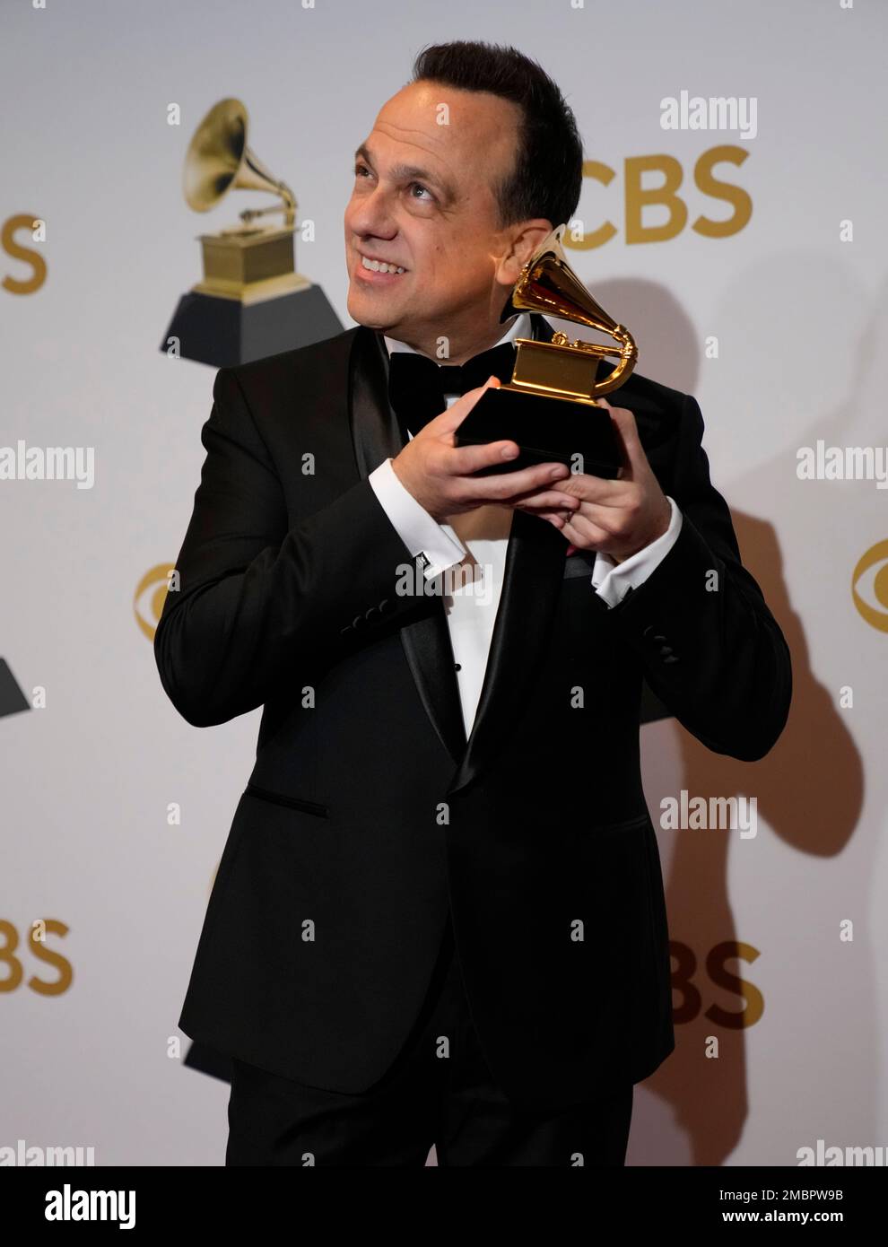 Carlos Rafael Rivera poses in the press room with the award for best ...
