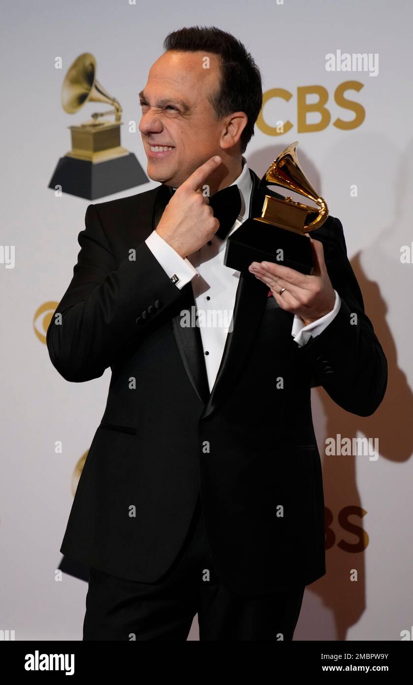 Carlos Rafael Rivera poses in the press room with the award for best ...
