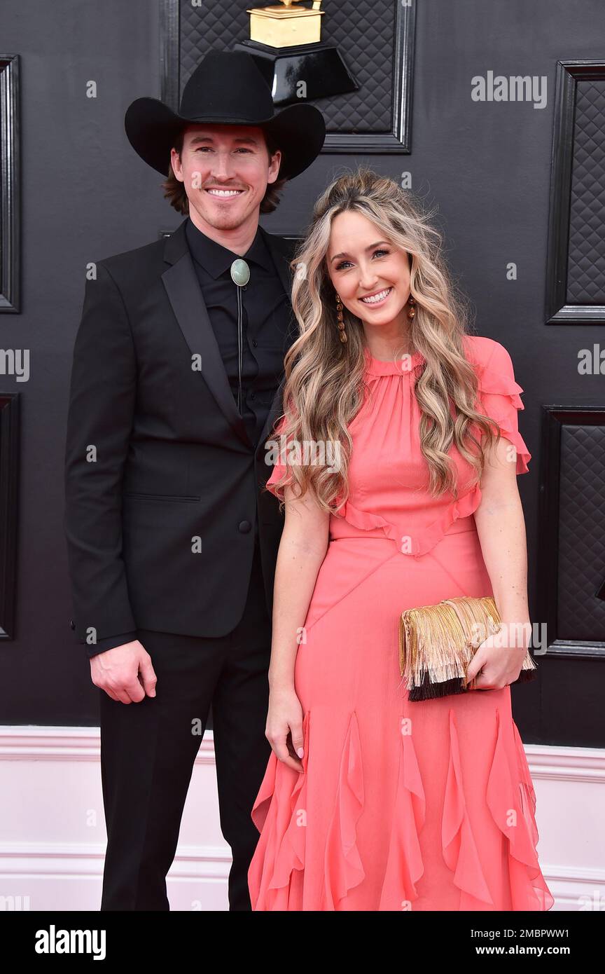 Spencer Nohe, left, and Parker Welling arrive at the 64th Annual Grammy ...