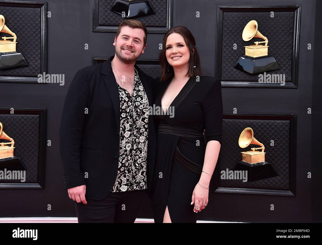 Jimmy Robbins, left, and Sarah Robbins arrive at the 64th Annual Grammy ...