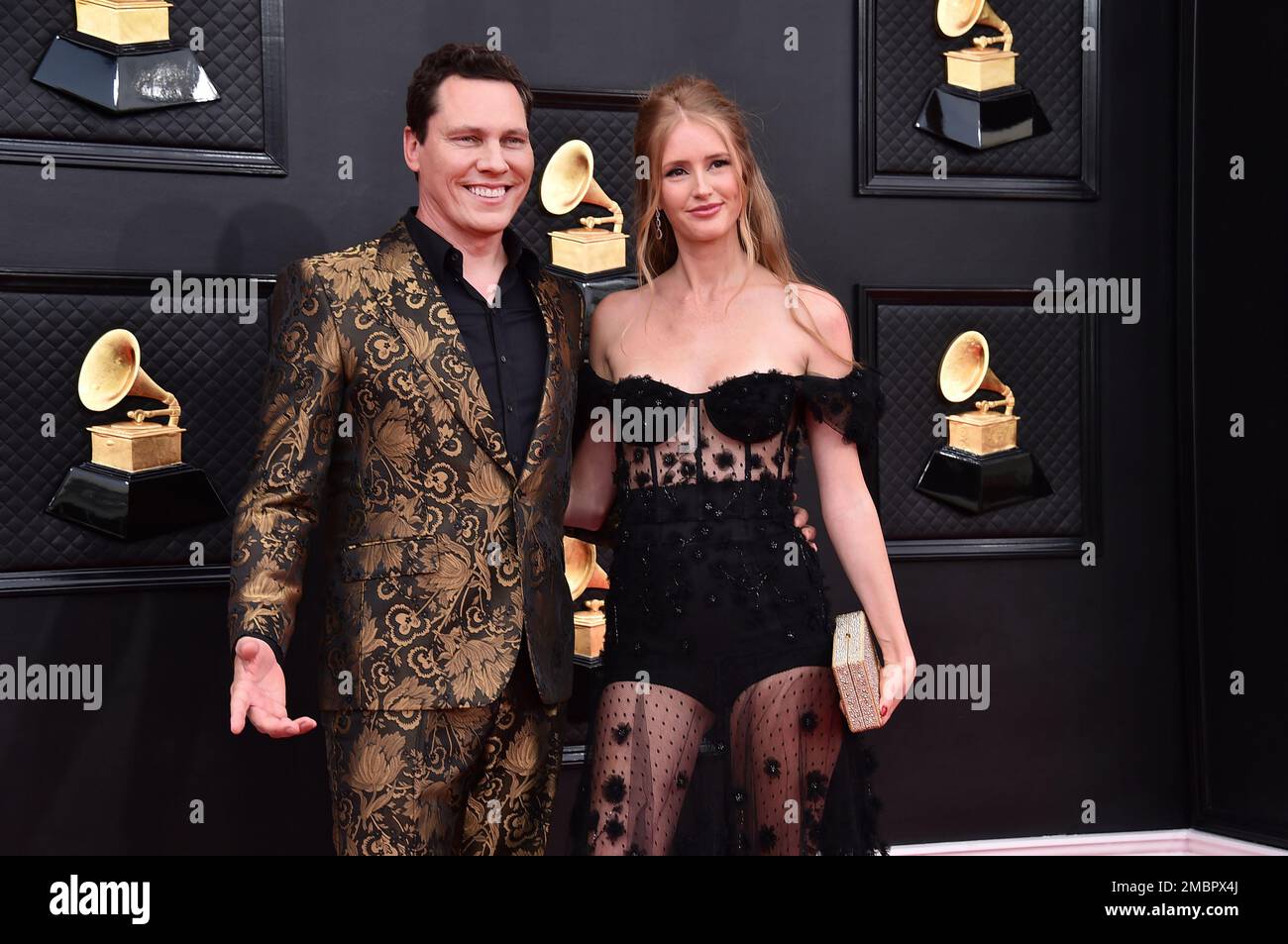 Annika Backes Verwest, left, and Tiesto arrive at the 64th Annual ...