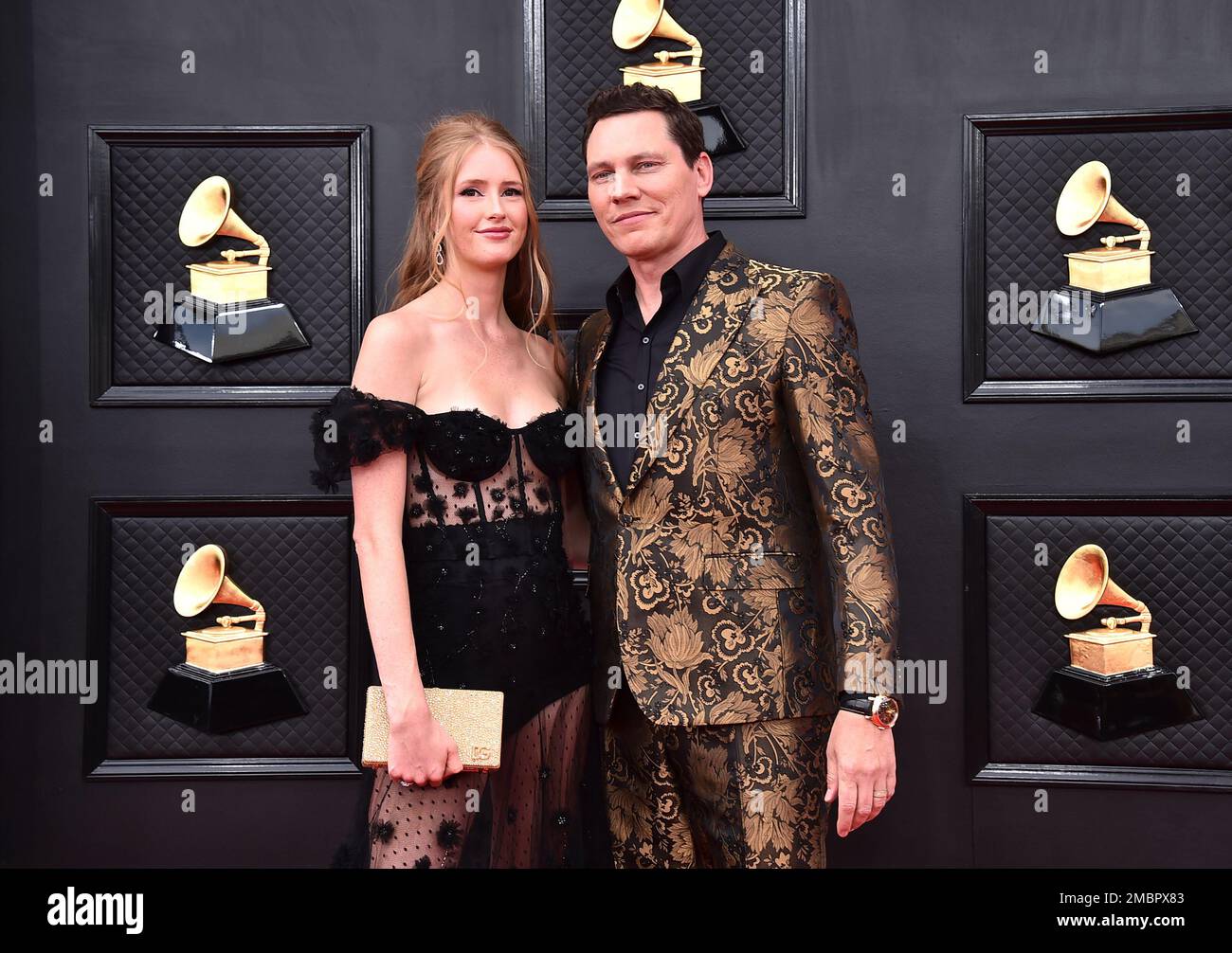 Annika Backes Verwest, left, and Tiesto arrive at the 64th Annual ...