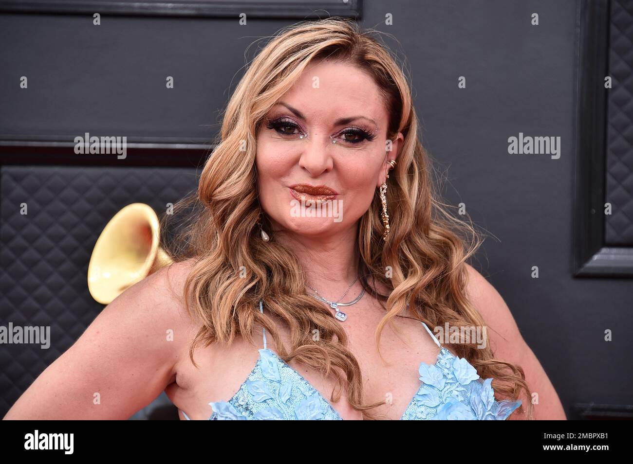 Mari Nobre arrives at the 64th Annual Grammy Awards at the MGM Grand Garden Arena on Sunday ...