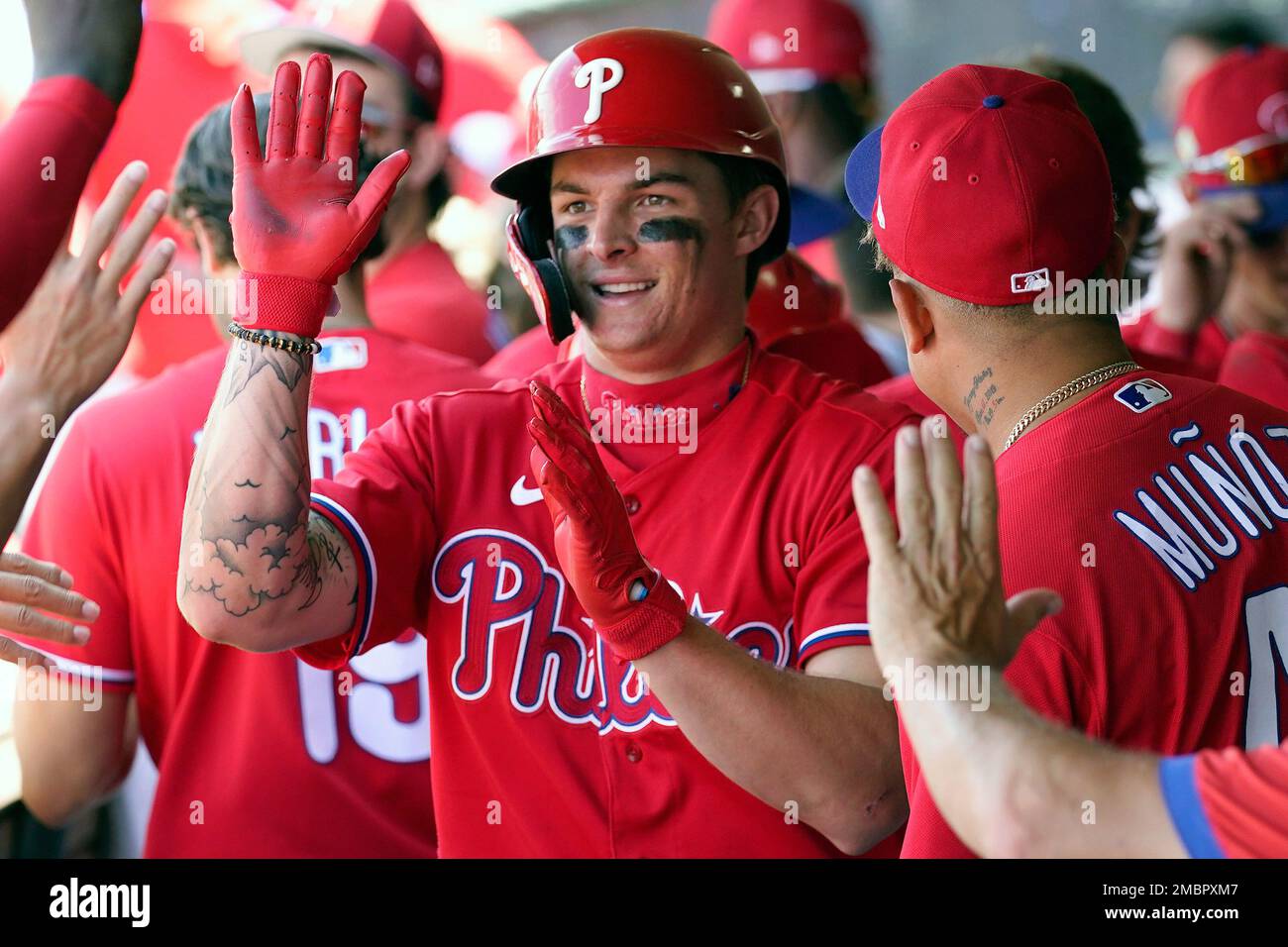 Philadelphia Phillies' Mickey Moniak is congratulated after hitting a ...