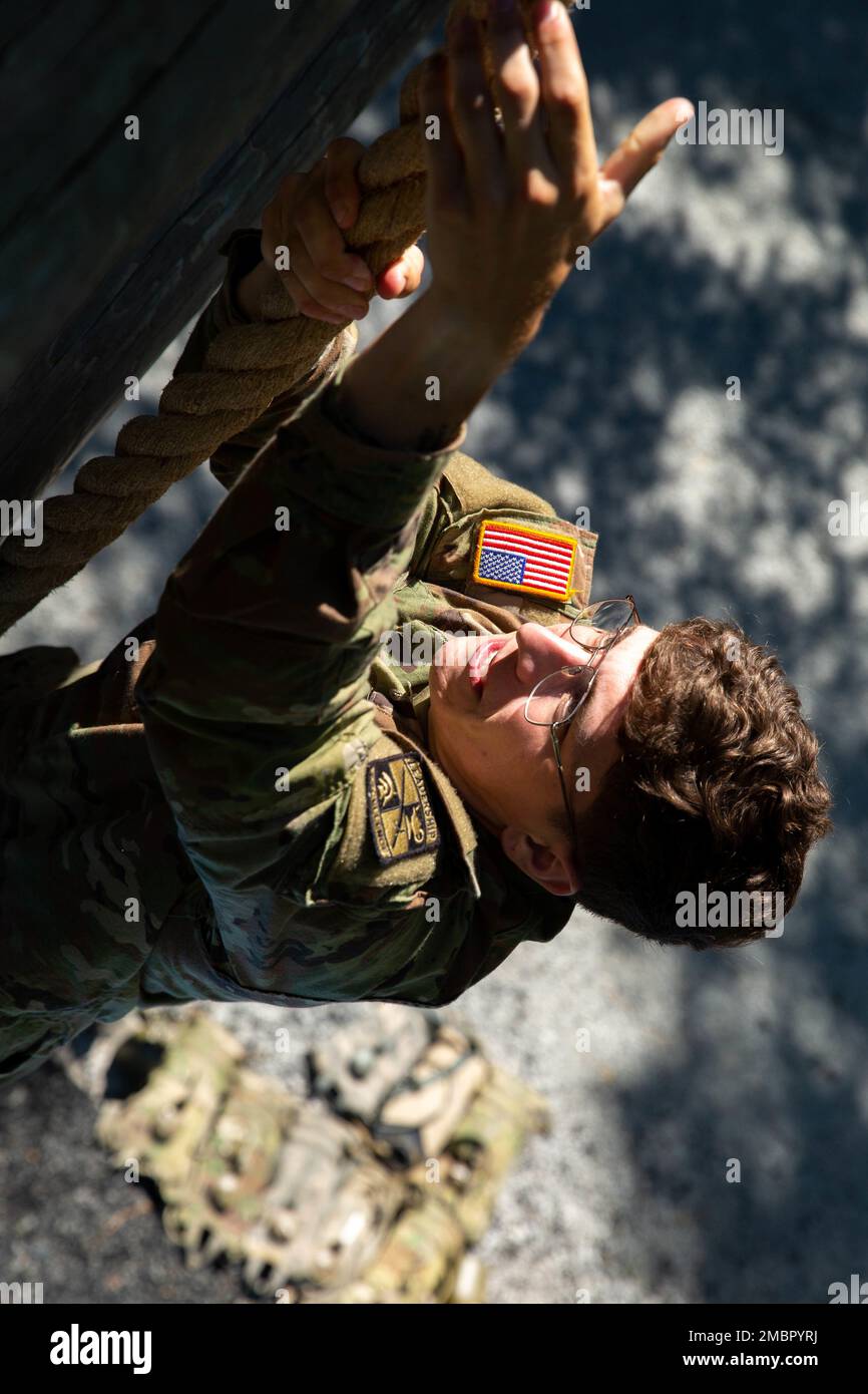 Army ROTC Cadet Caleb Hunnicutt, Clemson University, climbs a rope ...