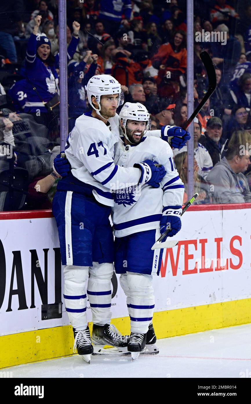Toronto Maple Leafs' Pierre Engvall celebrates with Colin Blackwell ...