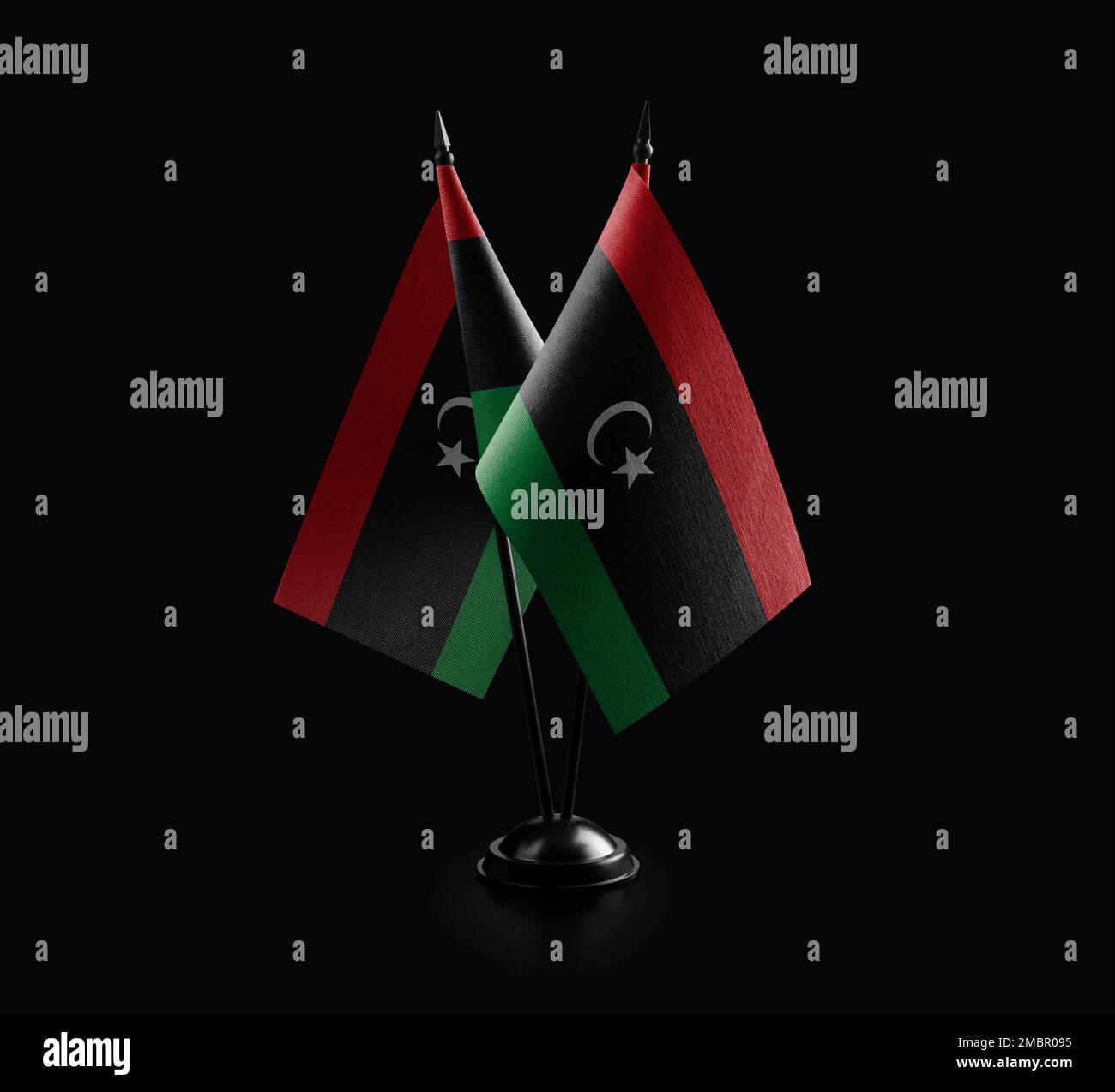 Small national flags of the Libya on a black background Stock Photo - Alamy