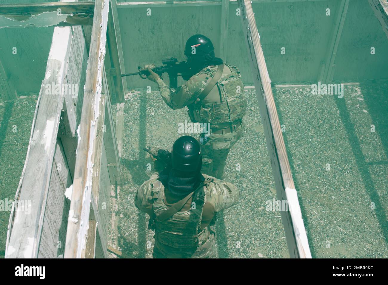 152nd Security Forces Squadron (SFS) Airmen participate in a shoot ...