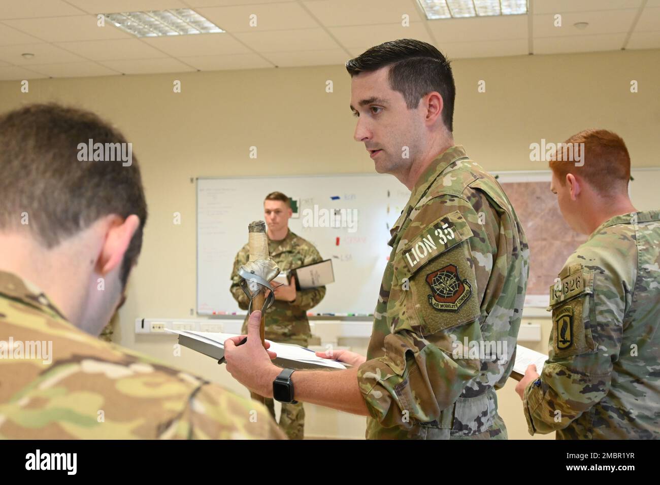 U.S. Air Force Maj. Daniel Ryan briefs during a Joint Combined Arms ...